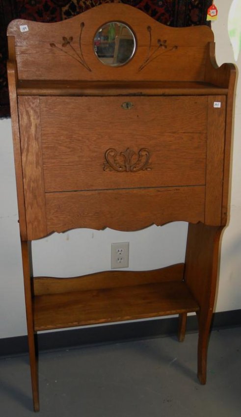Antique Larkin desk w/ inset mirror, spoon carvings & a : Lot 222