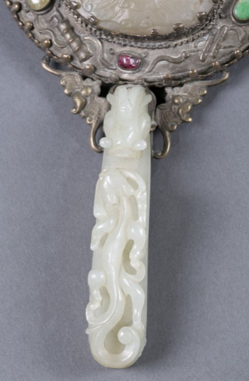 A Chinese jade medallion hand mirror. : Lot 380