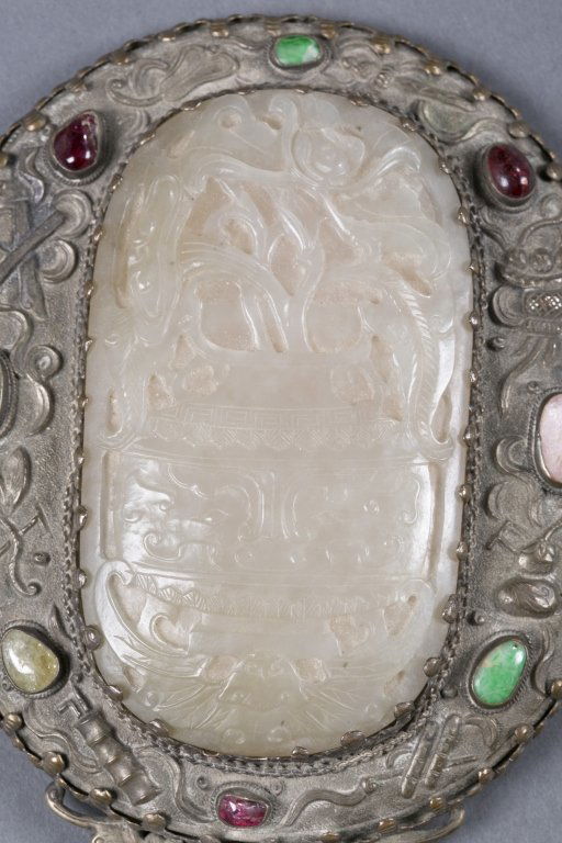 A Chinese jade medallion hand mirror. : Lot 380