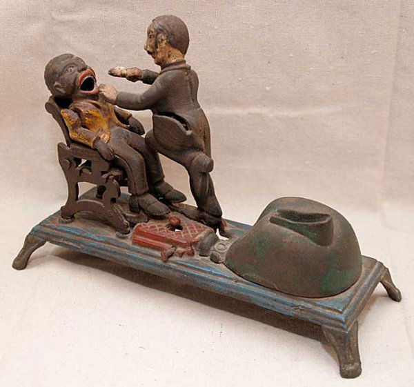 35: Antique cast iron bank, "Black man in Dentist Chair : Lot 35
