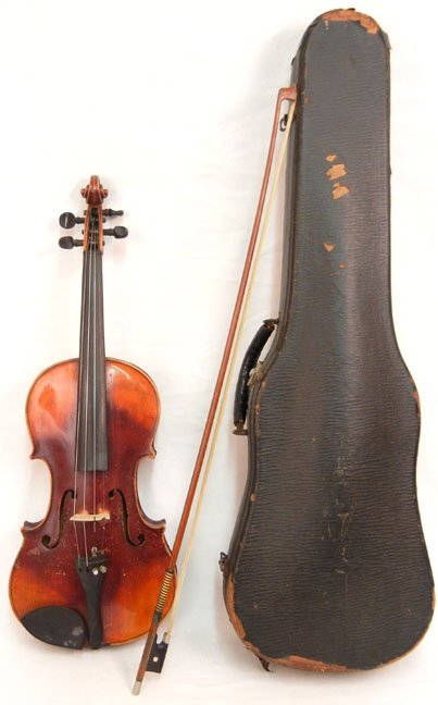 Joseph Guarnerius violin in case, label inside violin m : Lot 519