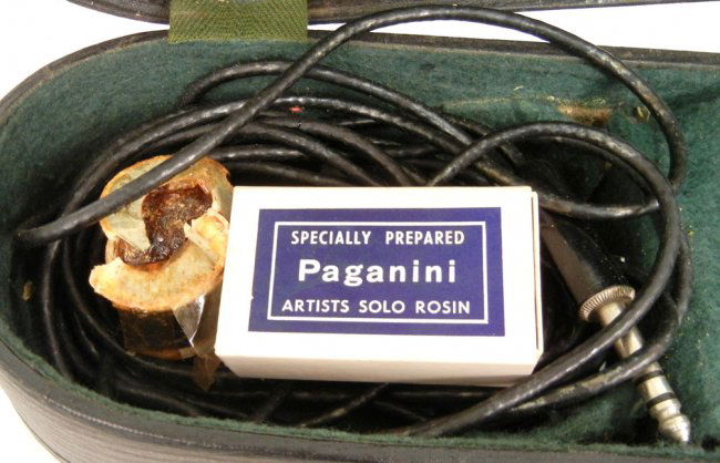 Joseph Guarnerius violin in case, label inside violin m : Lot 519